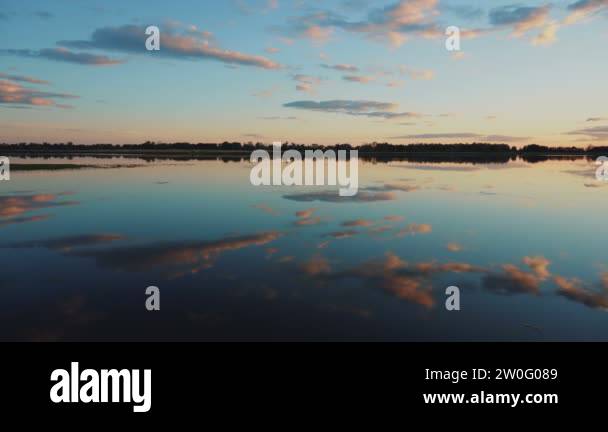 Lake reflects the sky Stock Videos & Footage - HD and 4K Video Clips ...
