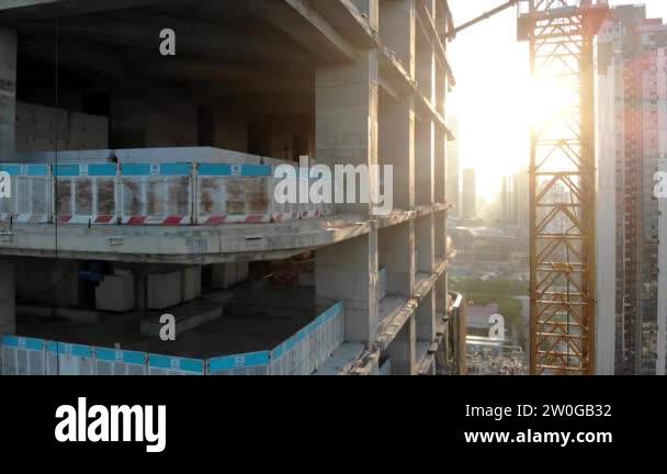 Worker is Installing the Precast Glass Panel on The Construction Site ...