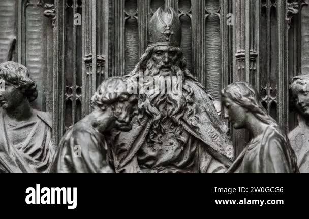 Beautiful Duomo di Milano iron gates decor in close up.Jesus Christ ...
