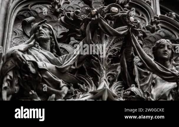 Beautiful Duomo di Milano iron gates decor in close up.Jesus Christ ...