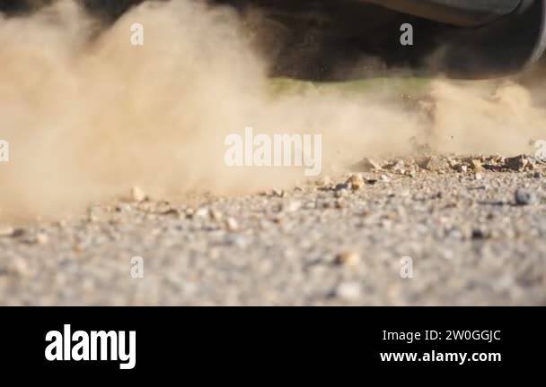 Wheel of car are slip on a asphalt road during start of movement. Small ...