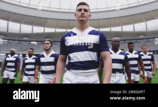 Low angle view of diverse male rugby players walking together in the ...