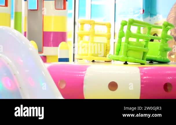 rotation of children's rides in the recreation area Stock Video Footage ...