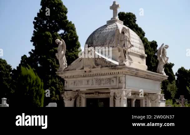 Beautiful crypt in cemetery. Action. Burial structure with dome in ...