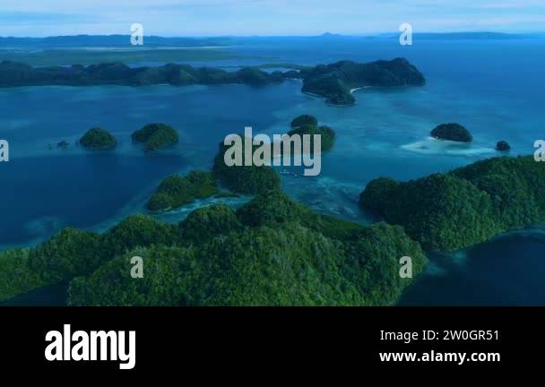 Tropical landscape rainforest hills and azure water in lagoon with ...