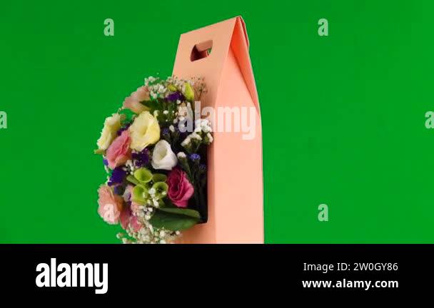 happy birthday greetings. box with a beautiful bouquet rotates on a ...