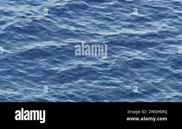 Seamlessly looped water surface texture, calm blue sea waves background ...