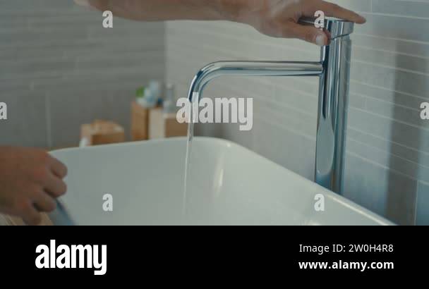 High quality 4k 12bit footage. Body care. Person rinsing hands in ...