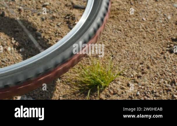 bike fell wheel rotates close to, road accident Stock Video Footage - Alamy
