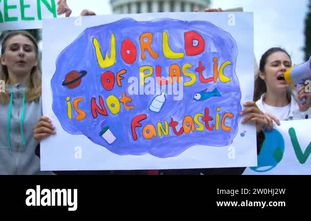 Crowd chanting environmental slogans, awareness about plastic pollution ...