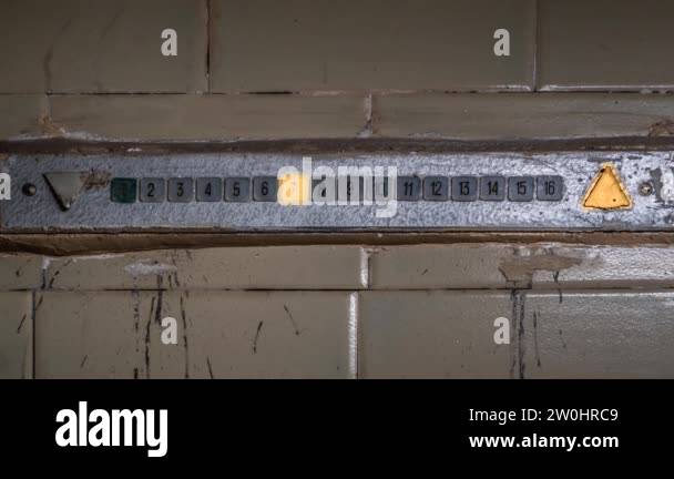 Old obsolete elevator dislocation information panel. This panel shows ...