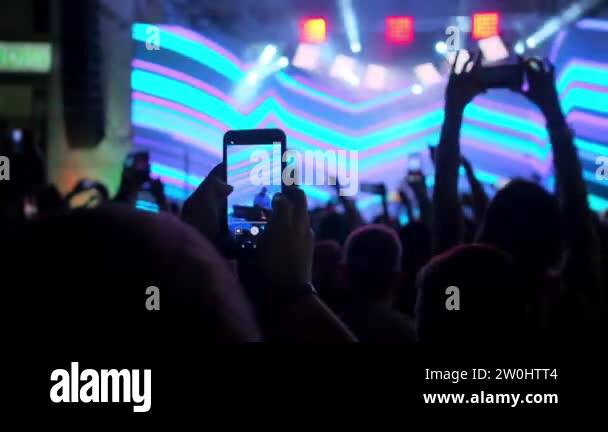 Filming concert Stock Videos & Footage - HD and 4K Video Clips - Alamy