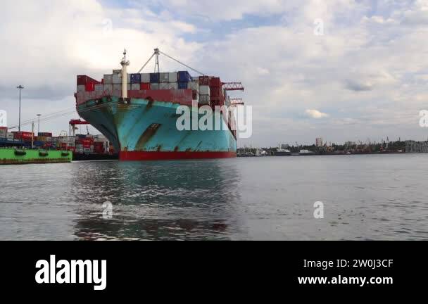 SINGAPORE - MAY 08 2020: Container cargo ship load in the seaport ...