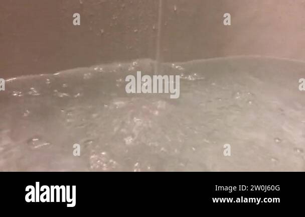 Water boiling in spillway under old hydropower plant Stock Video ...