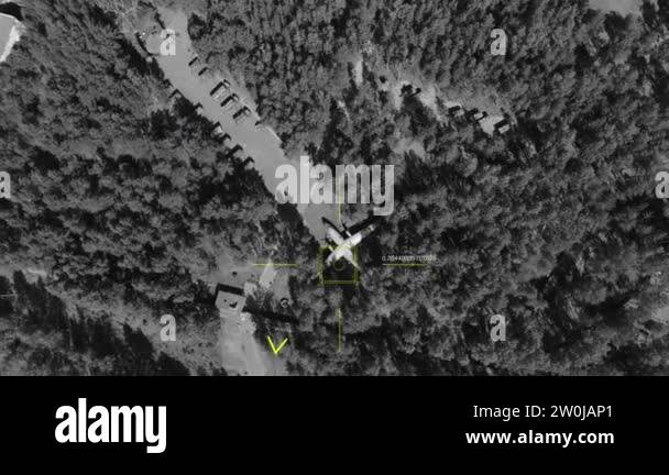 Top view of the military drone destroys objects on a hidden military ...