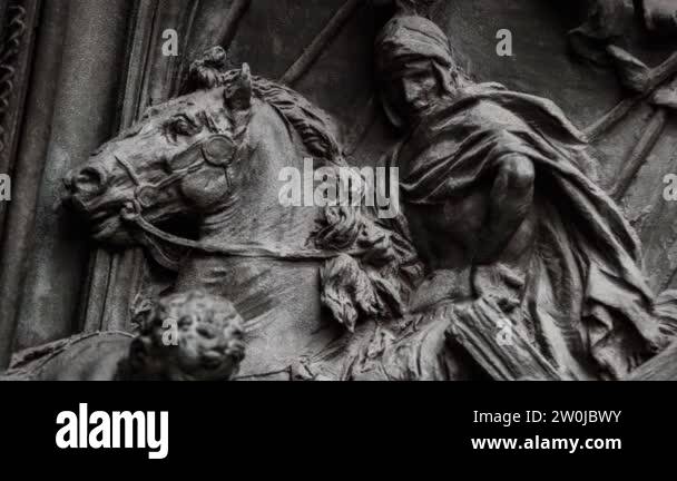 Beautiful Duomo di Milano iron gates decor in close up.Jesus Christ ...