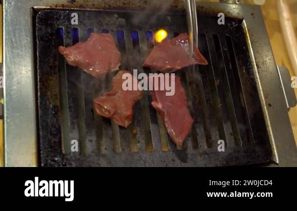 Slow Motion of premium and fresh tongue wagyu beef raw sliced served ...