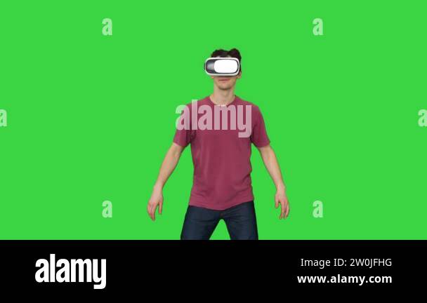Casual man in VR glasses dancing playing video game Beginners level on ...
