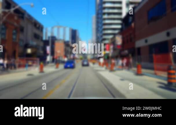 Driving Downtown City Street With Blur Effect. Driver Point of View POV ...