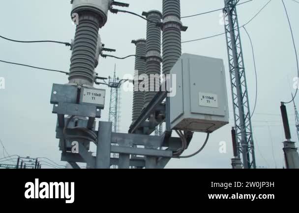 High voltage substation 110 kV with tall pylons and hog voltage ...