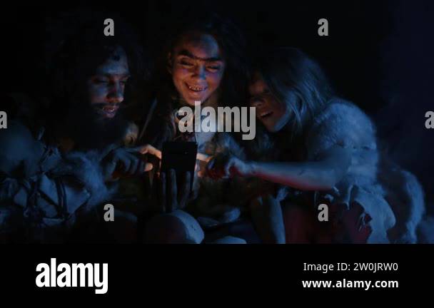 Tribe of Prehistoric, Primitive Hunter-Gatherers Wearing Animal Skins ...