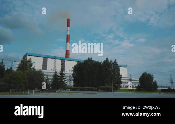 Steam, smoke from pipes at a thermal power station. Russia Novosibirsk ...