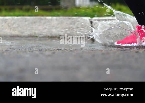 Legs of a runner in sneakers. Sports woman jogging outdoors, stepping ...