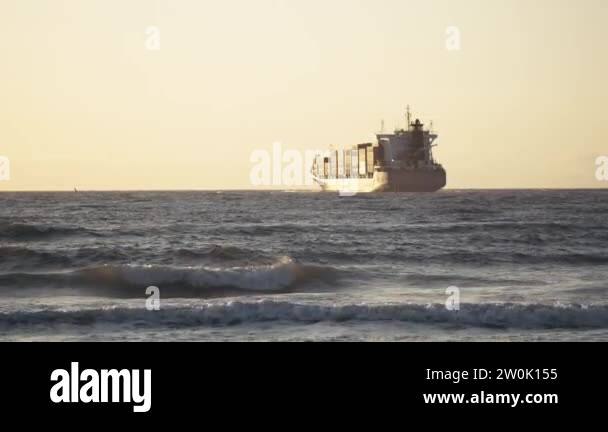 Container ship goes into the open sea. Container ship deliver products ...