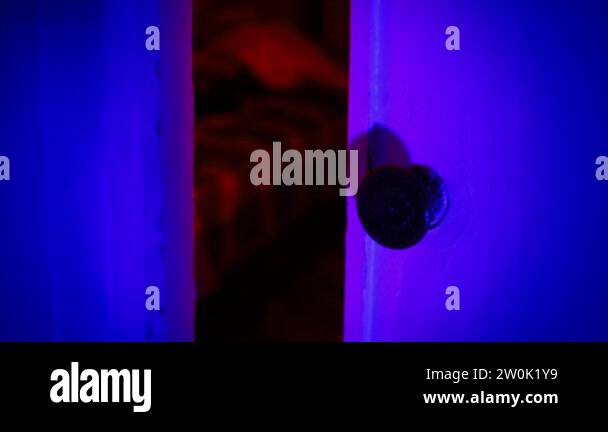 Red light flickers in an empty room. Crime scene. Fear of loneliness ...