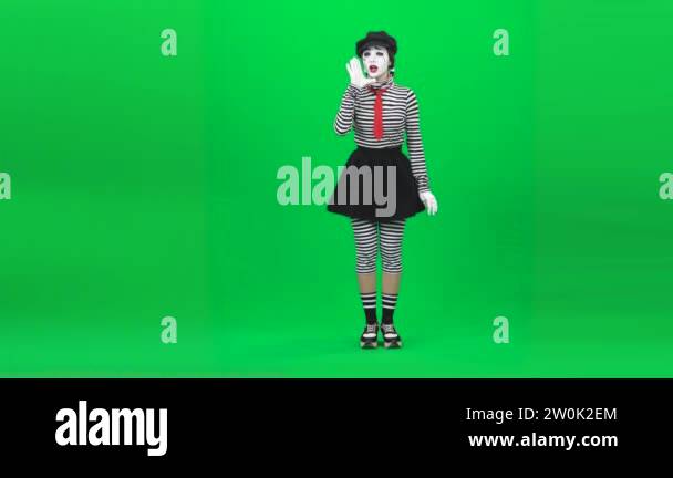 Mime woman calling someone through shout. Chroma key. Full length Stock ...