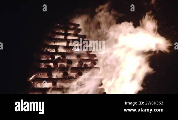 Fire flames and sparks in sacrificial fire. slow motion isolated on ...