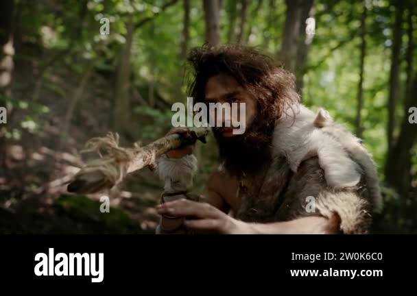 Close-up Portrait of Primeval Caveman Wearing Animal Skin and Fur ...