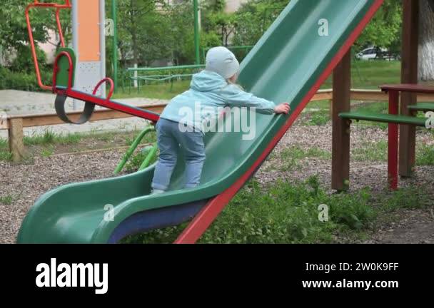 Girl climbing up slide Stock Videos & Footage - HD and 4K Video Clips ...