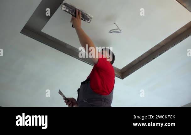 Handyman apply plaster on ceiling Stock Videos & Footage - HD and 4K ...