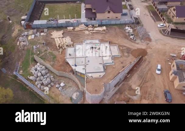 Aerial view of new modern cottage near the building site, construction ...
