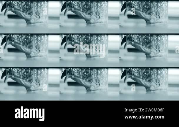 Stereolithography DPL, SLA 3d printer creating shape by UV ...