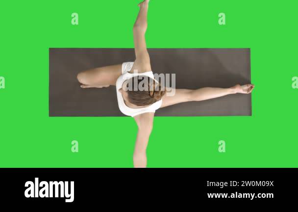 Crescent Lunge on the Knee Yoga Practice Woman in White Clothes on a ...