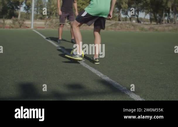 Football team players making kick-off in the pitch Stock Video Footage ...