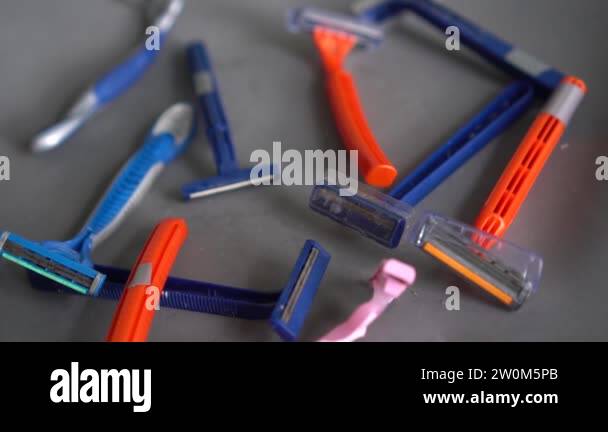 Bunch of old disposable razors. The problem of plastic pollution of the ...