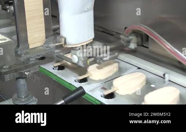 ice cream production, chocolate coating process on ice cream ...