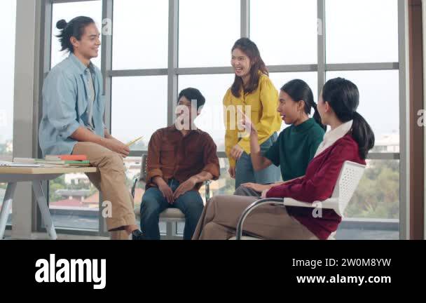 Group of young college students in smart casual wear on campus. Friends ...