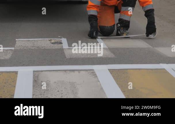 Road markings. Marking of a pedestrian crosswalk on a motorway ...