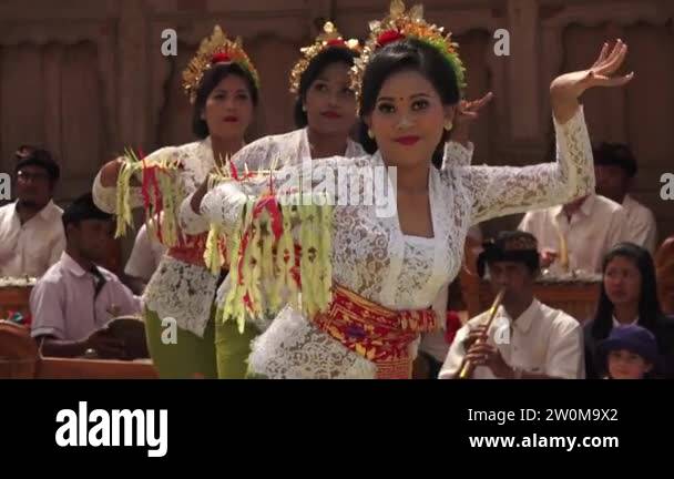 BALI - AUG 10 2019:Balinese women dancing Tari Pendet Dance. Pendet is ...