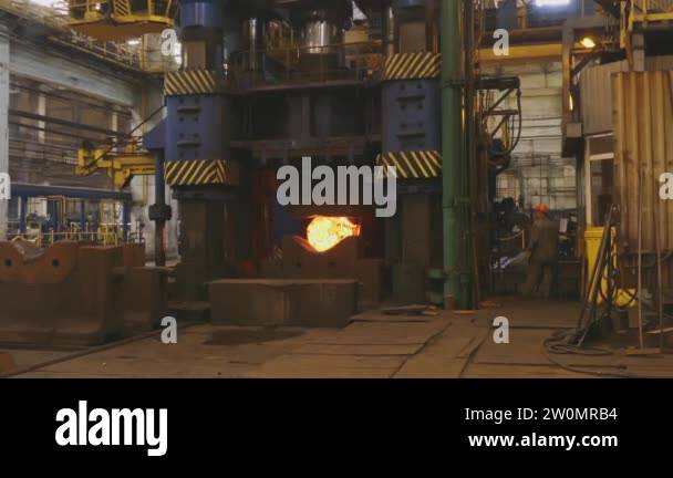 Molten metal blank. Billet forged in blacksmith the press. Machine ...