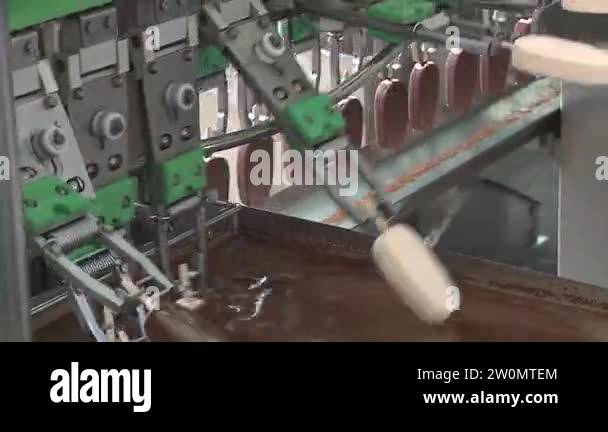 ice cream production, chocolate coating process on ice cream ...