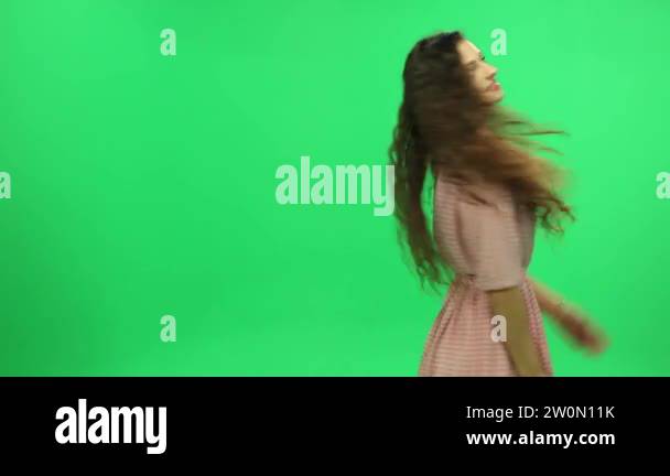 Beautiful girl spinning around,smiling,make a diffrent emotions, green ...