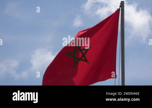 4K. Ultra HD. Beautiful big flag of Morocco waving in the wind. Blue ...