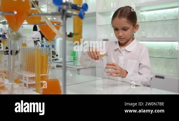 Kid Studying Chemical Experiments in School Lab, Student Girl Working ...