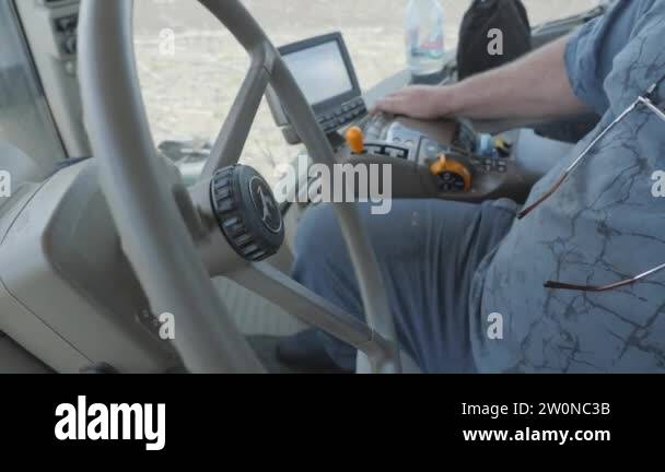 Operator's cab of a modern tractor with trailer equipment in the ...