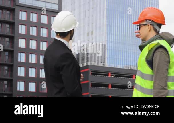 Engineer explaining drawing worker Stock Videos & Footage - HD and 4K ...